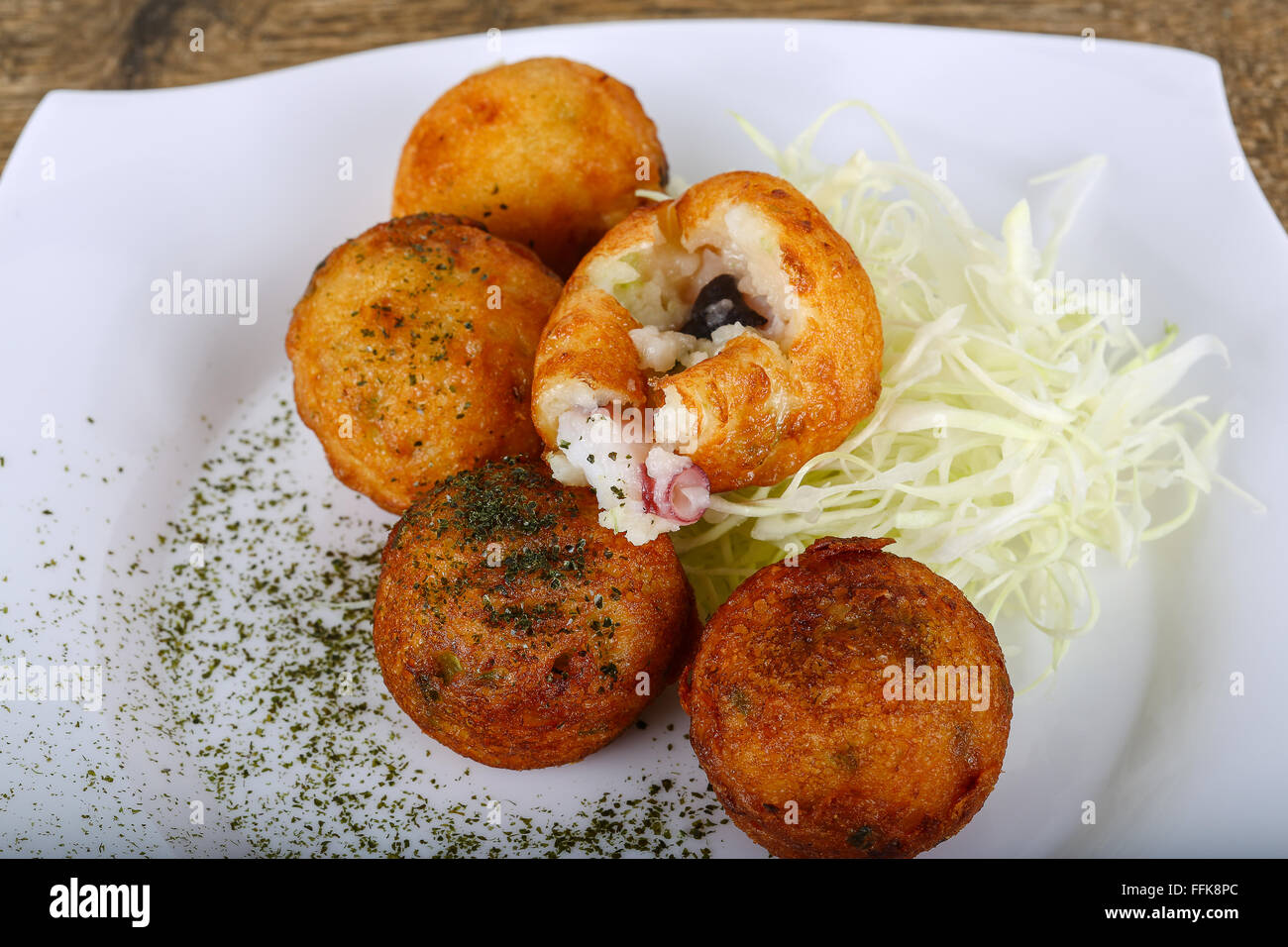 Japanese octopus balls with herbs and spices Stock Photo - Alamy