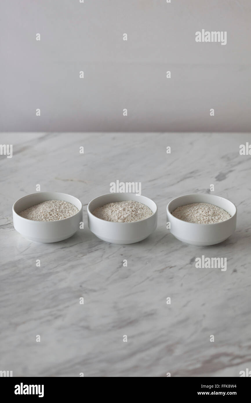 Three white marble table hi-res stock photography and images - Alamy