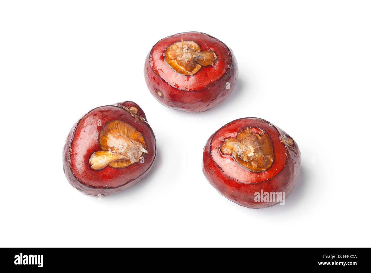 Whole water chestnuts on white background Stock Photo - Alamy
