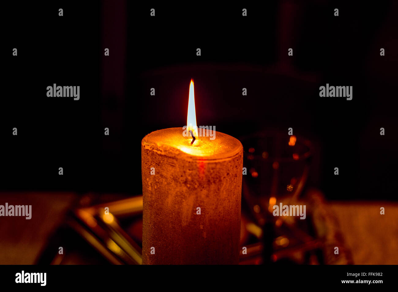 Candle on table Stock Photo - Alamy
