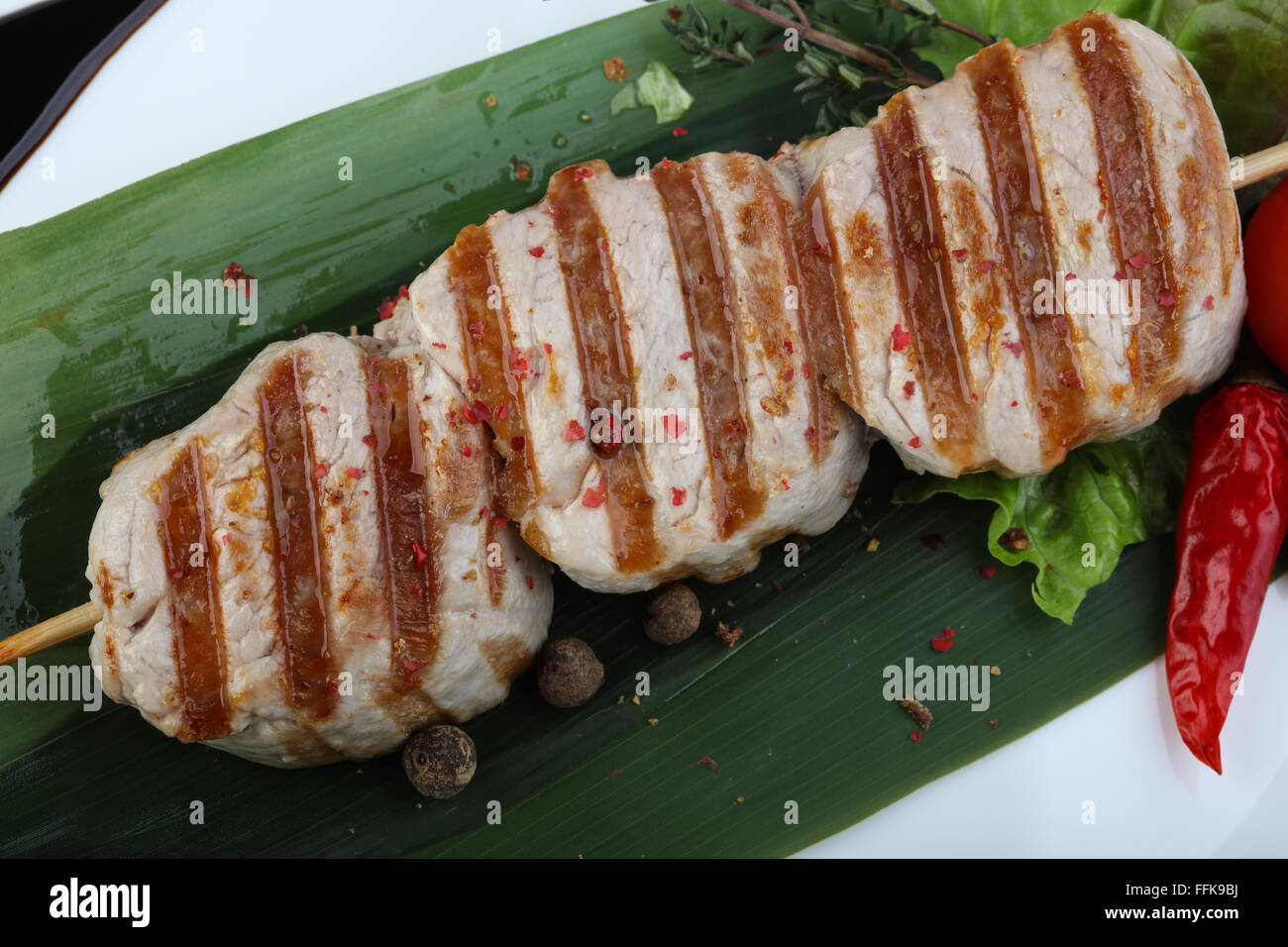 Grilled pork Fillet mignon with herbs and spices Stock Photo - Alamy