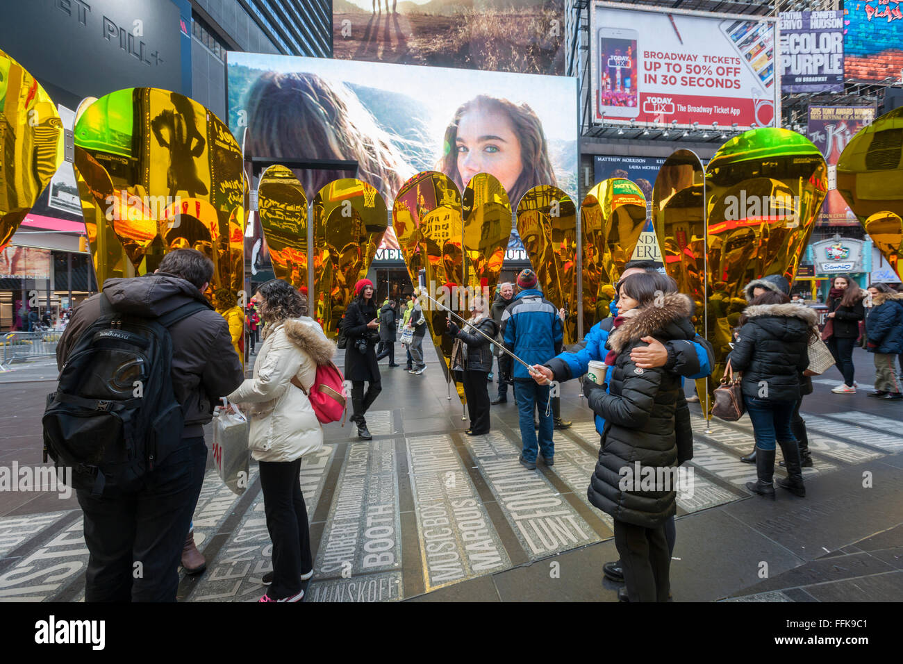 Visitors do selfies with their reflections in "Heart of Hearts", the ...