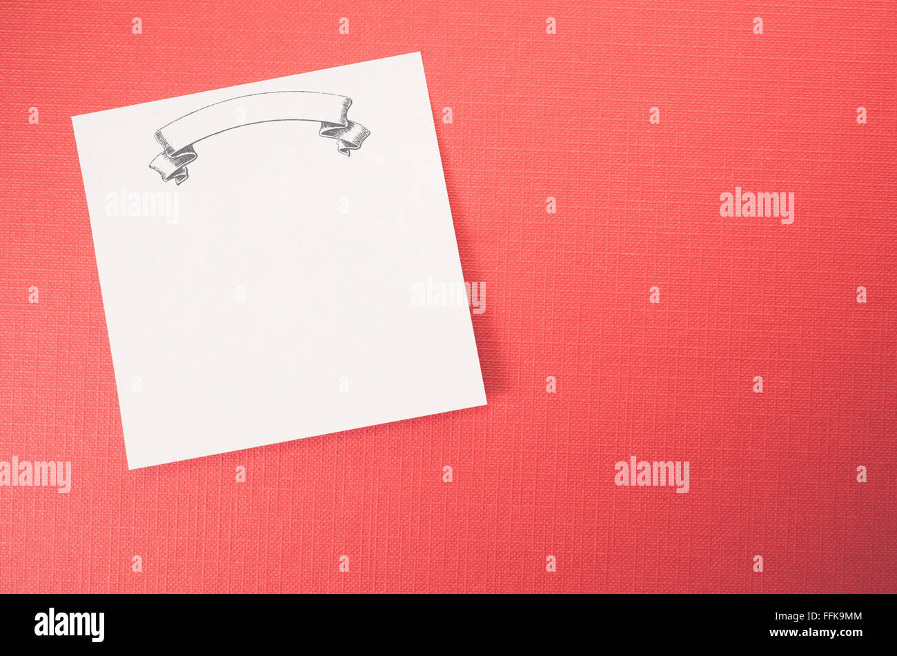 white blank memo with black banner on a red textured surface - copy ...