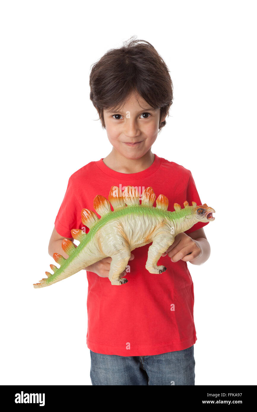 Little boy is showing his toy dinosaur on white background Stock Photo ...