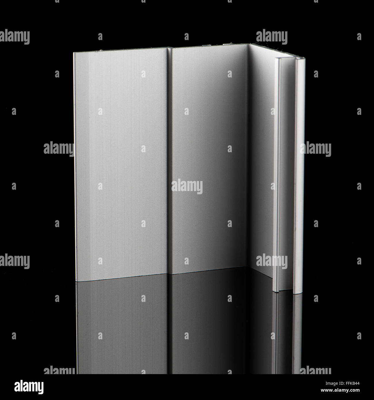 Aluminium profile sample isolated on black background Stock Photo - Alamy