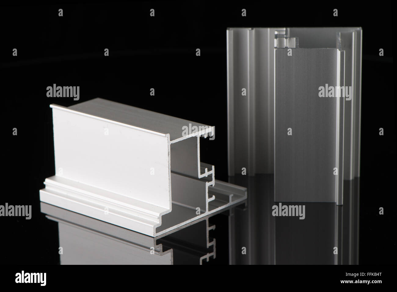Aluminium profile sample isolated on black background Stock Photo - Alamy