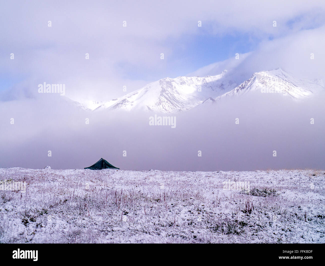 Mountain tent on ridge in winter hi-res stock photography and images ...