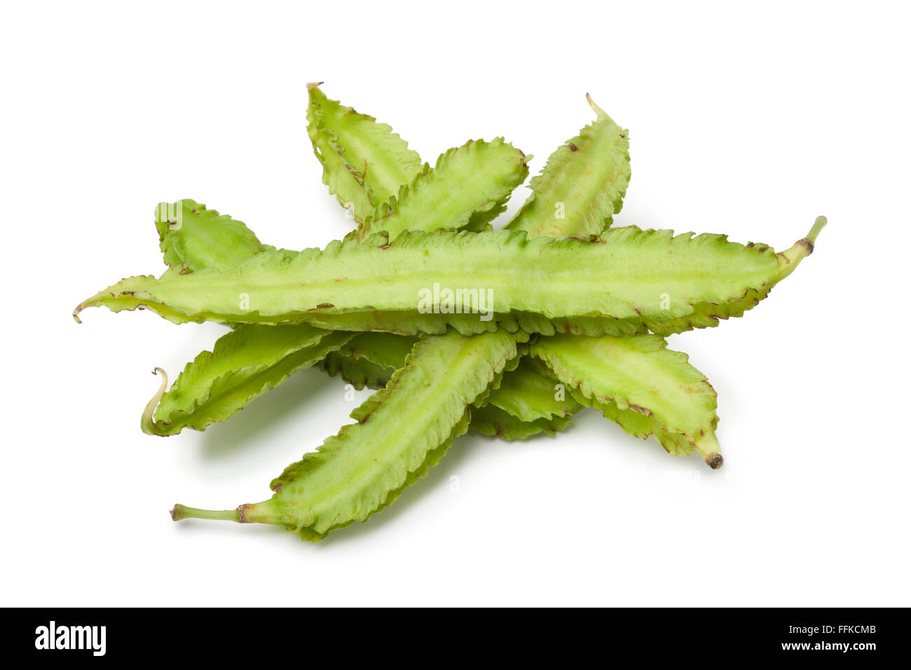 Fresh winged beans on white background Stock Photo - Alamy