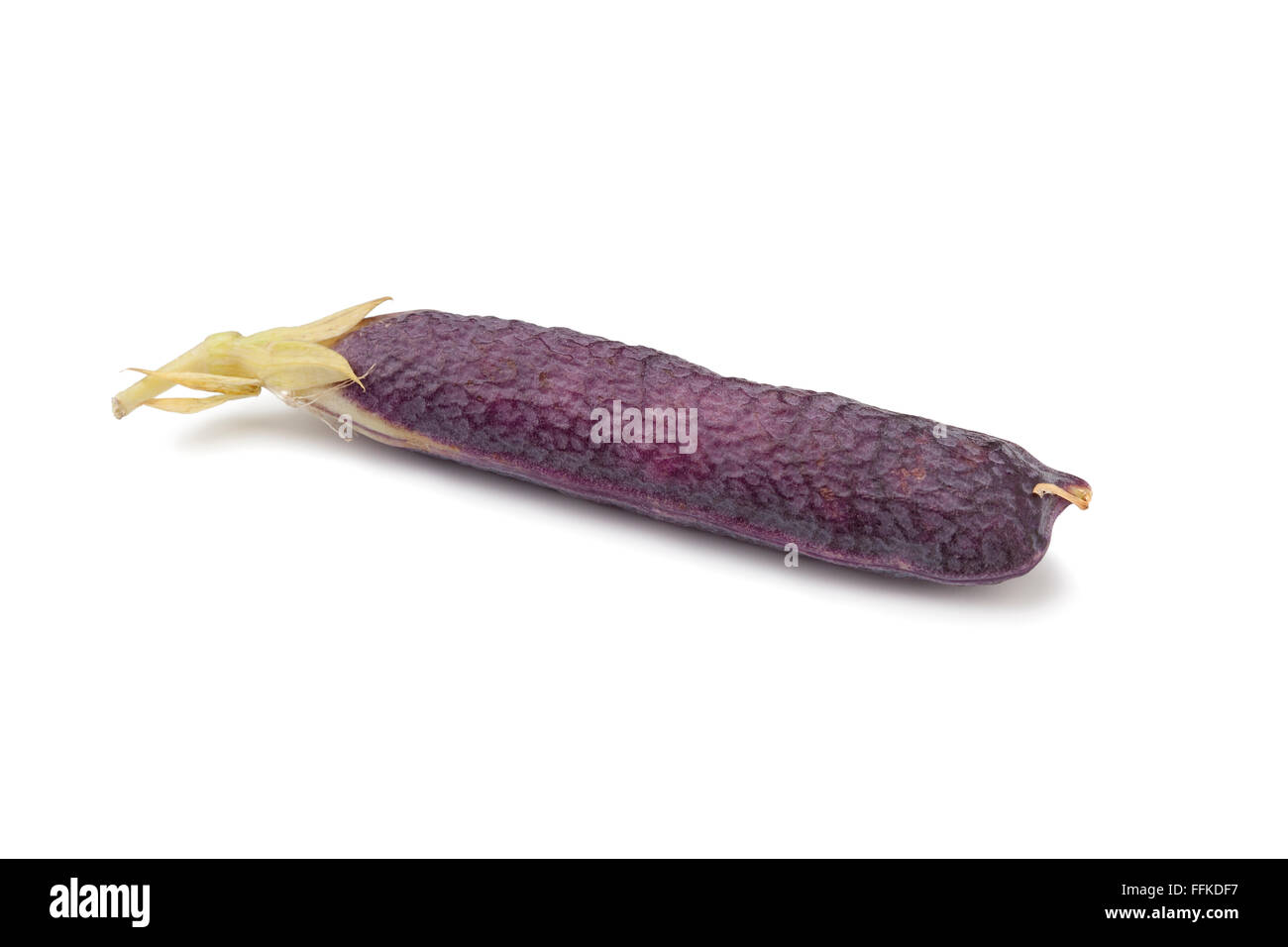 Fresh peas in purple pod on white background Stock Photo - Alamy
