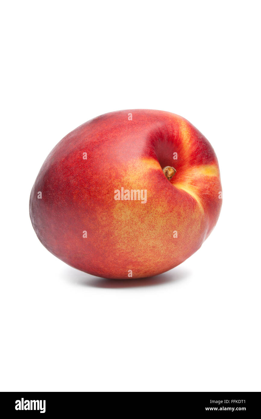 Whole single fresh nectarine on white background Stock Photo - Alamy