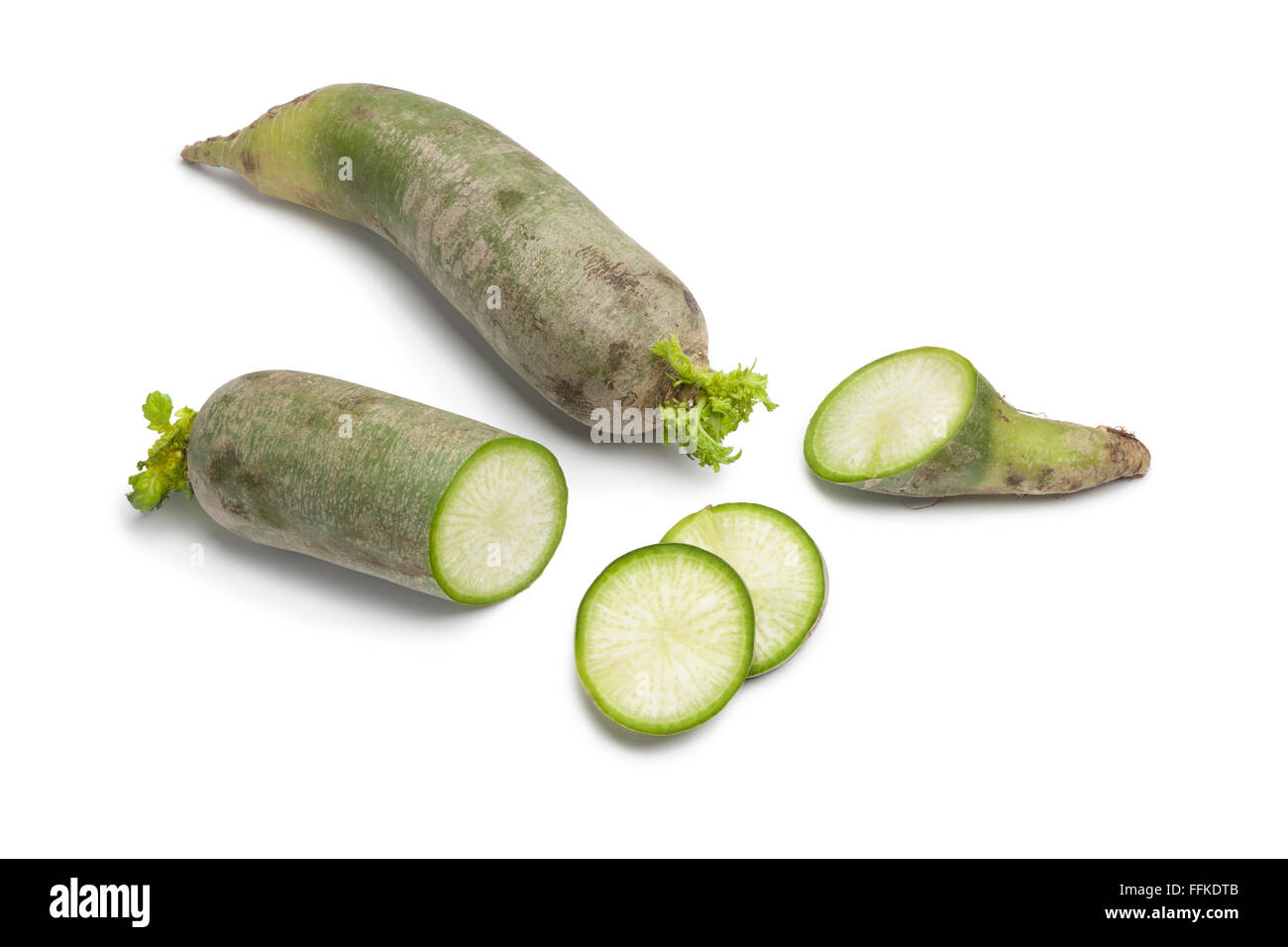 Fresh whole and sliced green radish on white background Stock Photo - Alamy