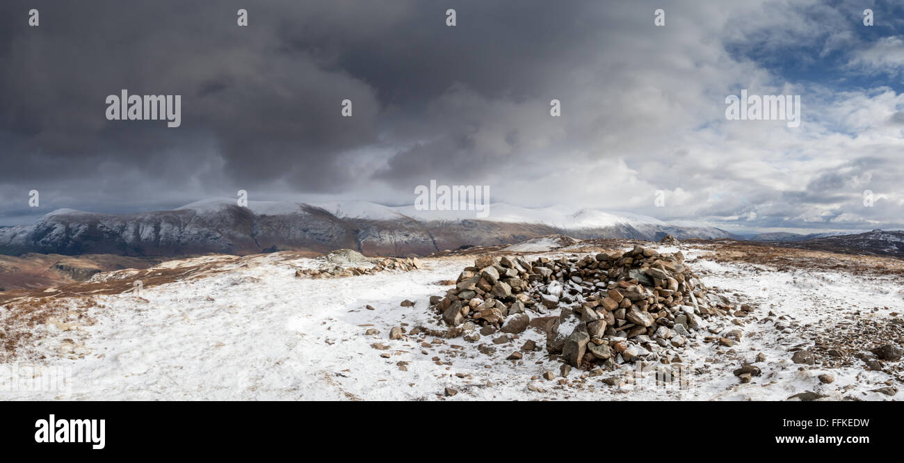 A snow storm approaches the Helvellyn range of fells in the English ...