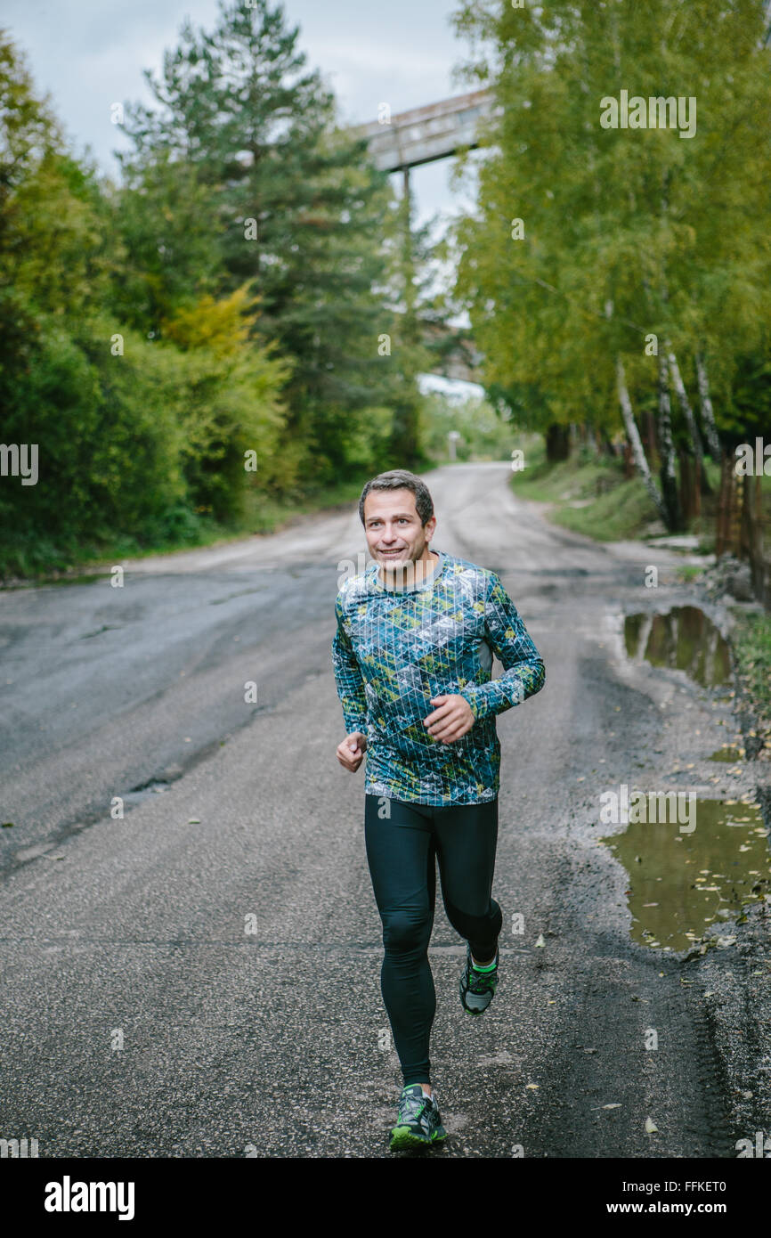 Man running hi-res stock photography and images - Alamy