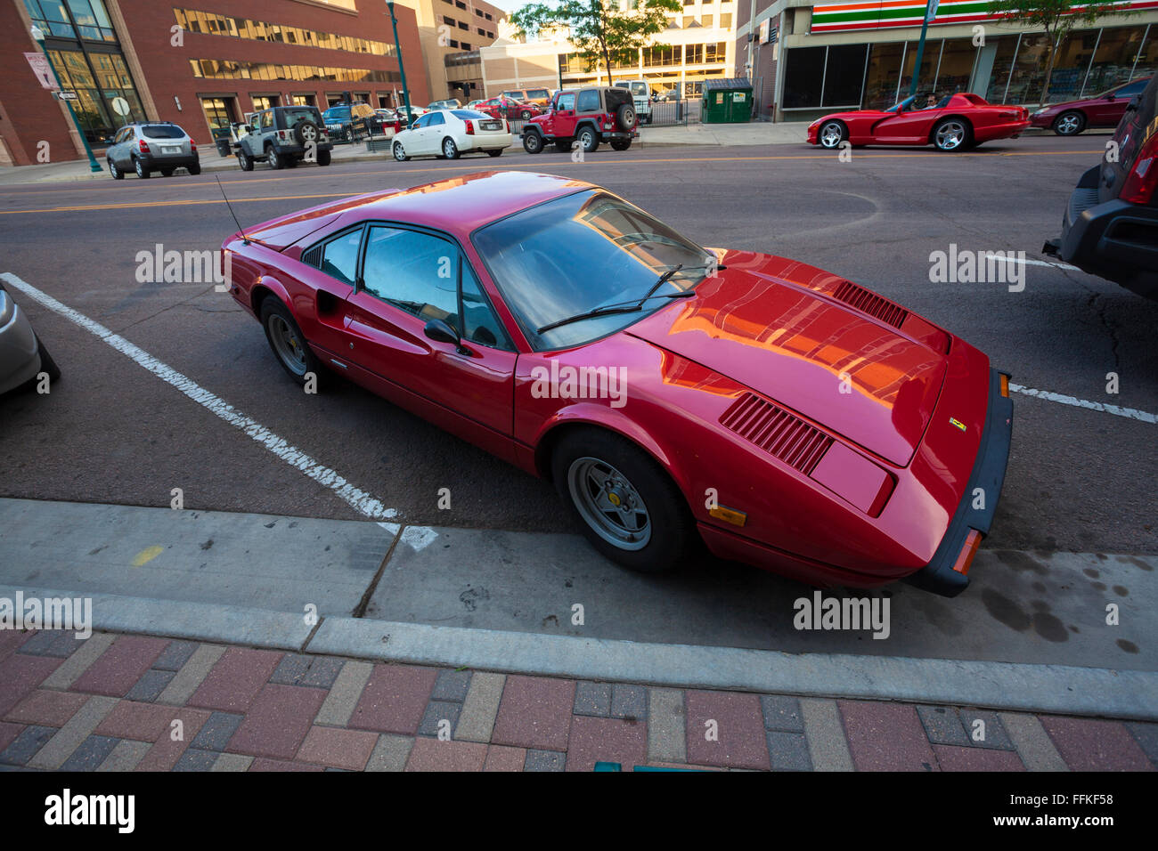 Red Ferrari sports car parked on street Stock Photo - Alamy