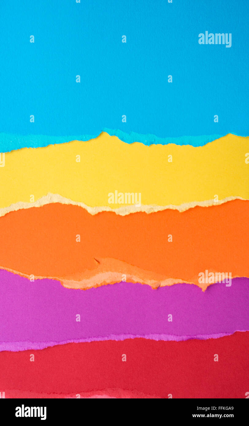 Abstract of torn pieces of colourful paper Stock Photo - Alamy