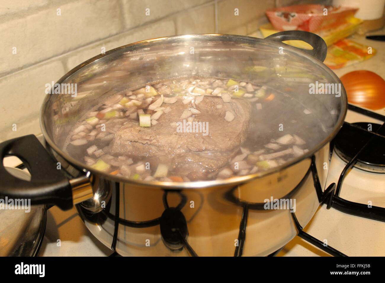 beef with vegetables in cooking pot Stock Photo - Alamy