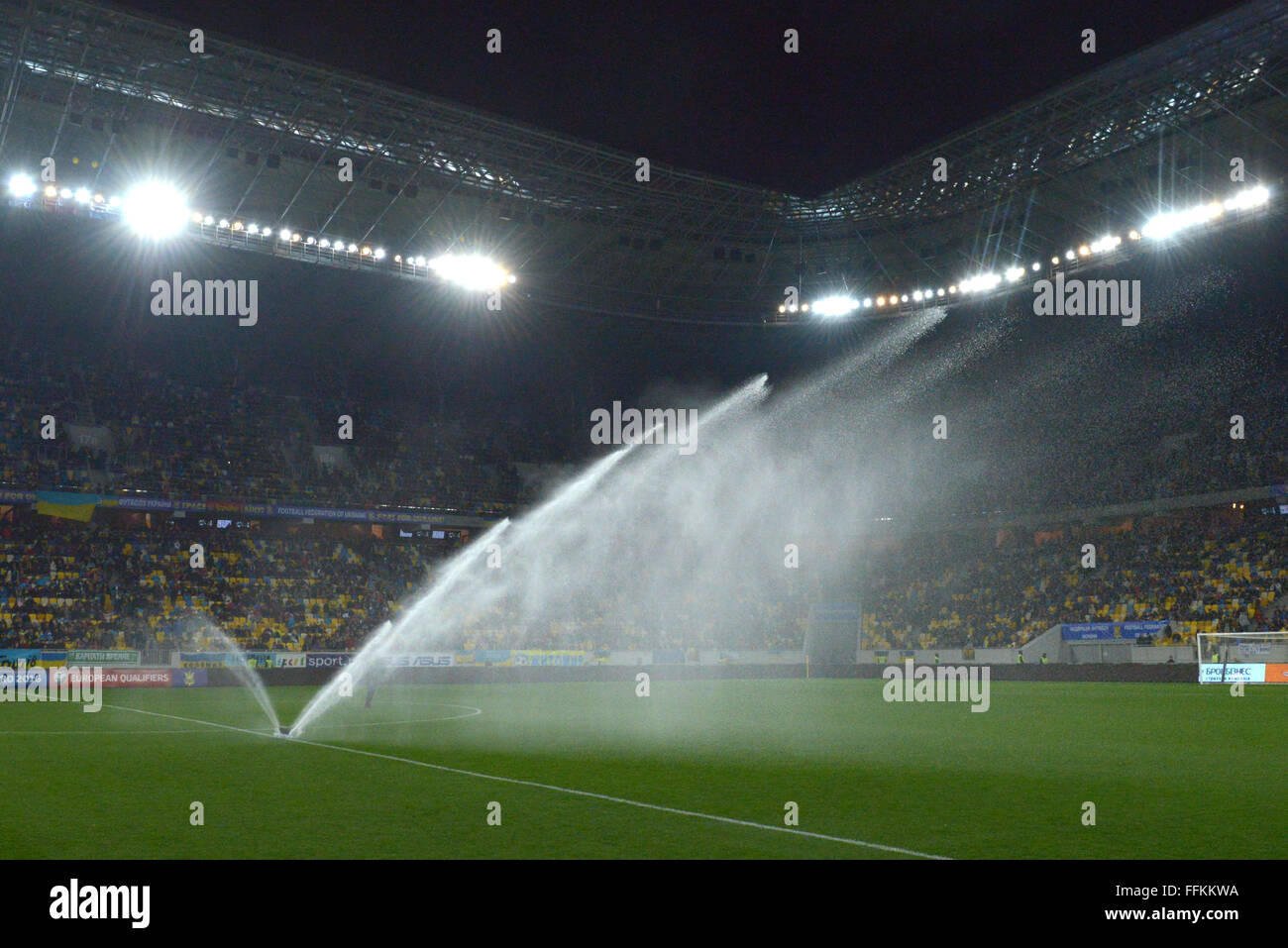 Watering soccer field during the UEFA EURO 2016 play-off soccer match ...