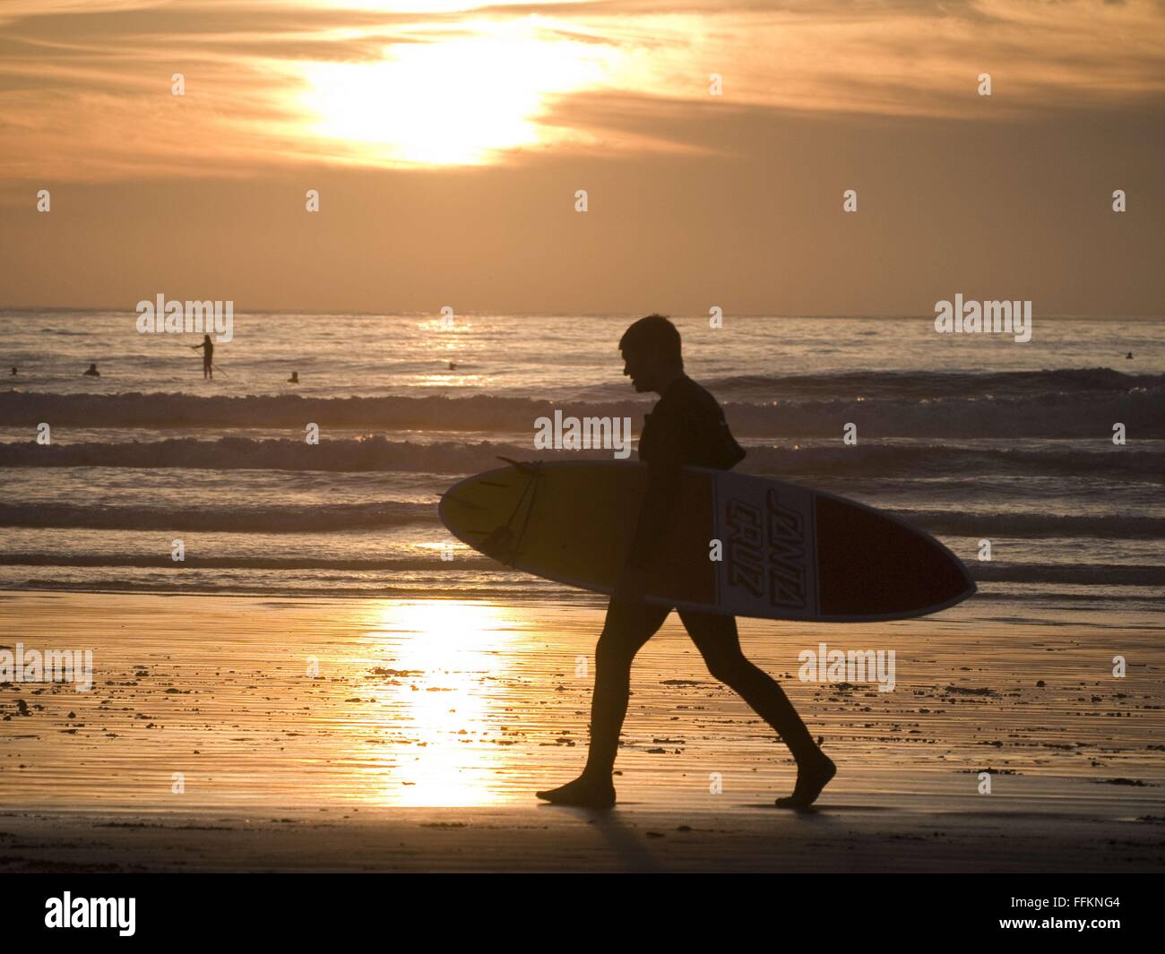 Feb. 17, 2013 - Morro Bay, California, U.S. - Surfer and surfboard on ...