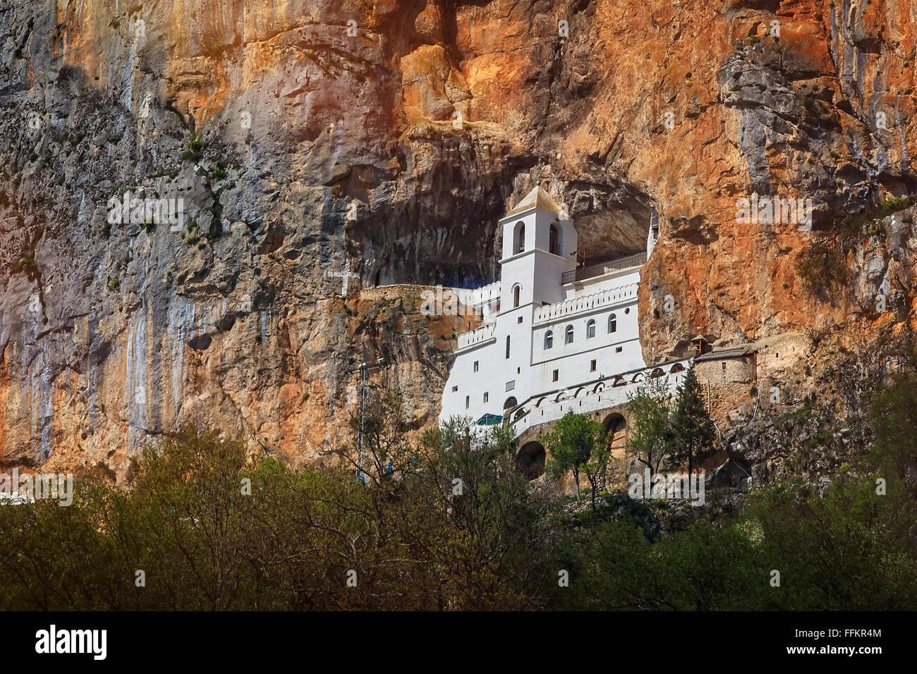 Monastery of Ostrog. Serbian Orthodox Church placed against an almost ...