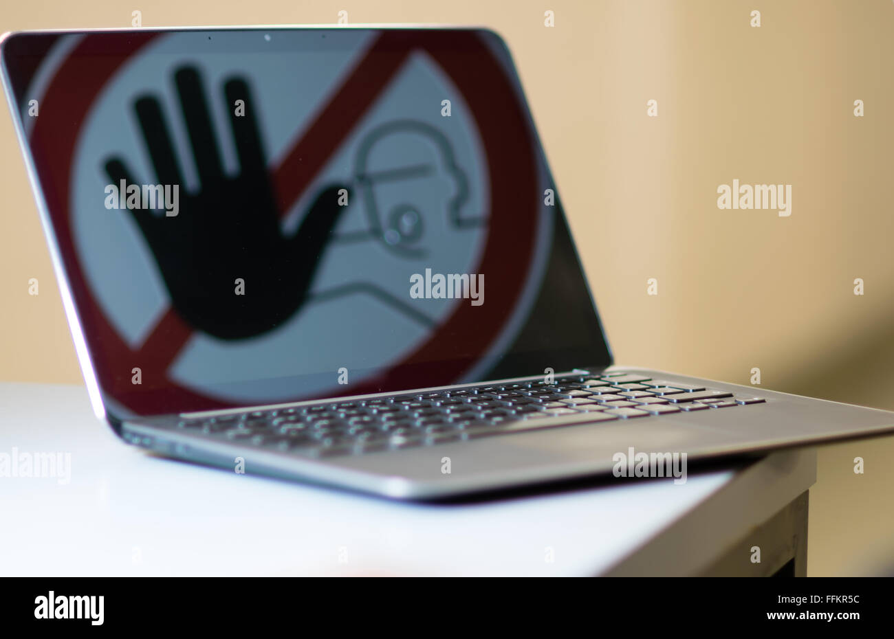 Stop sign in Notebook screen. Concept of stopping tinternet crime Stock ...