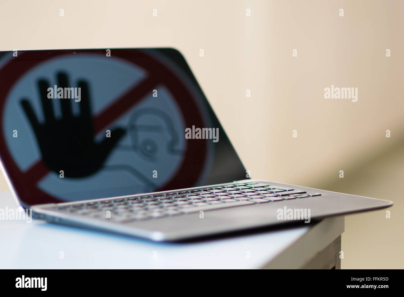 Stop sign in Notebook screen. Concept of stopping tinternet crime Stock ...