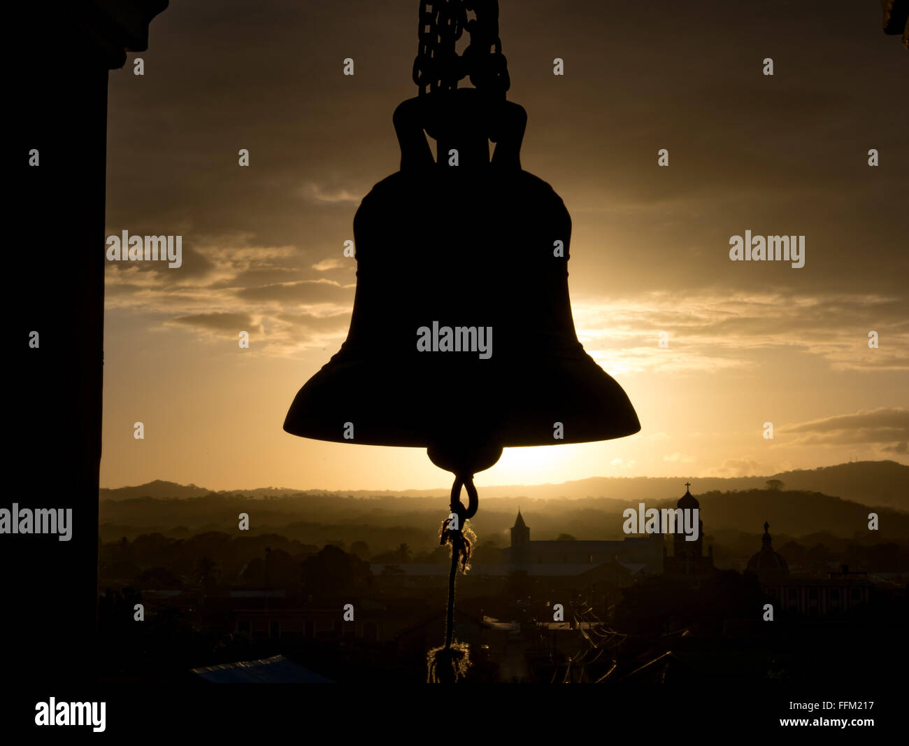 Bell in the Sunset Stock Photo - Alamy