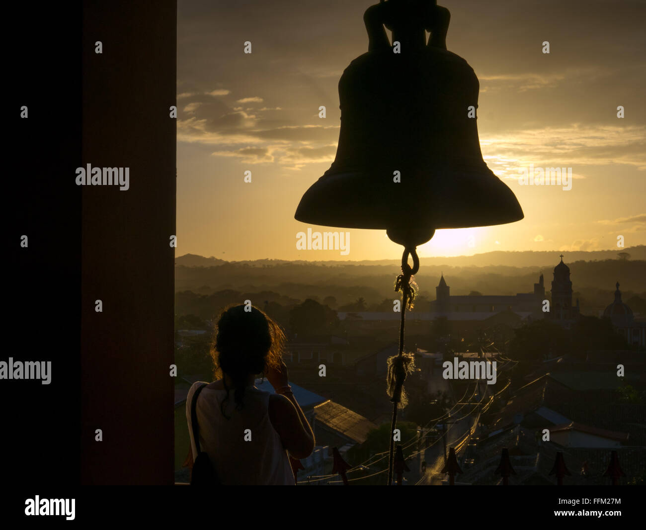 Bell in the Sunset Stock Photo - Alamy