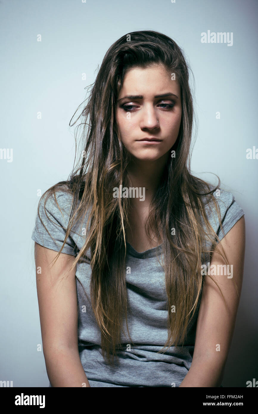 problem depressioned teenage with messed hair and sad face, real junky ...