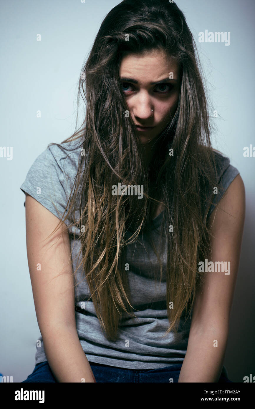 problem depressioned teenage with messed hair and sad face, real junky ...