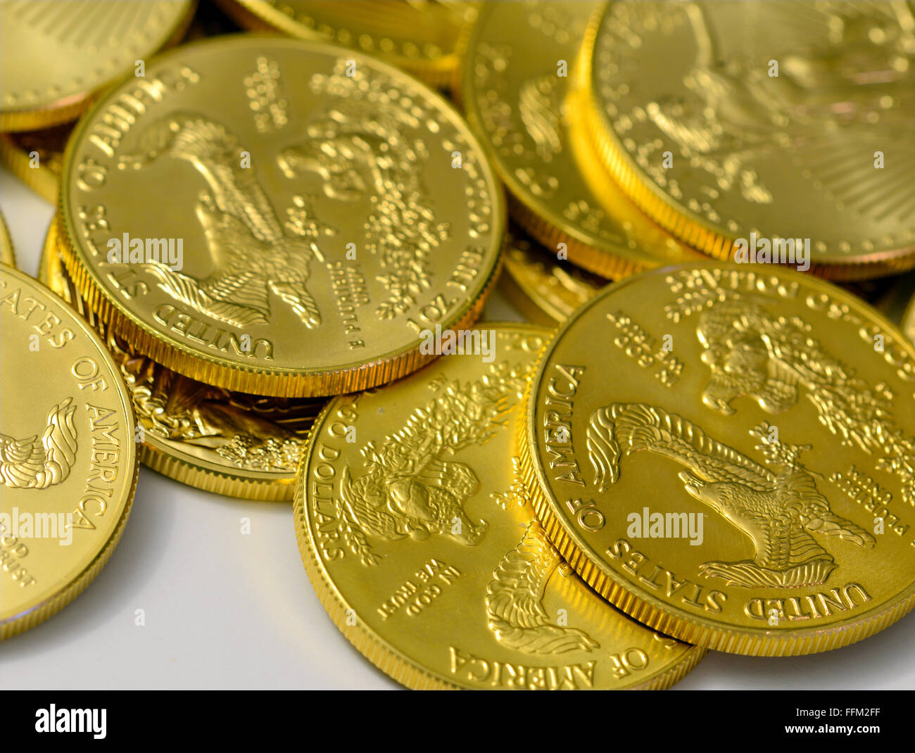 Gold coins together, representing concept of value, wealth or rare ...