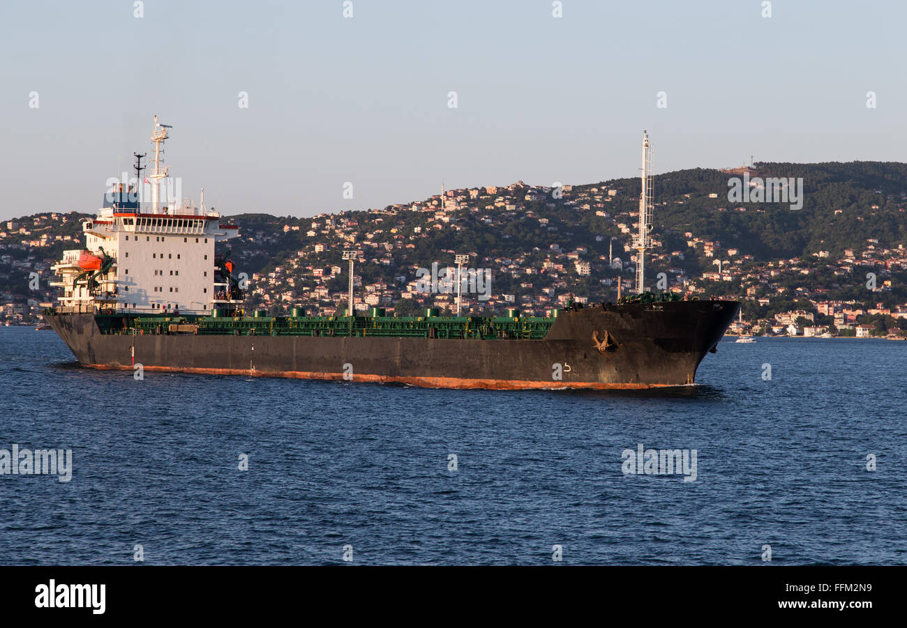 A cargo ship carrying goods between ports Stock Photo - Alamy