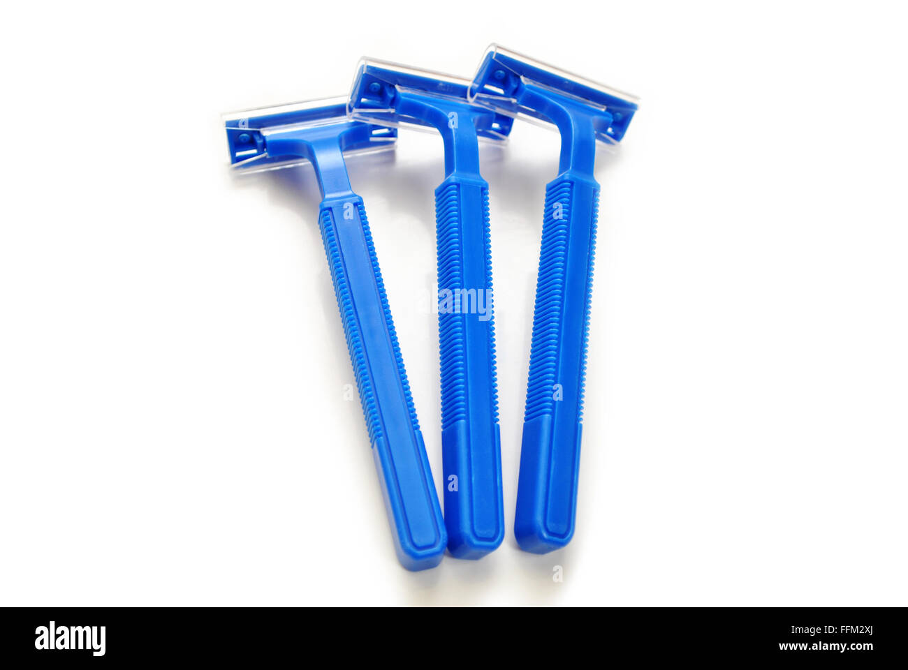 Blue Disposable Razors Isolated Over White Stock Photo - Alamy