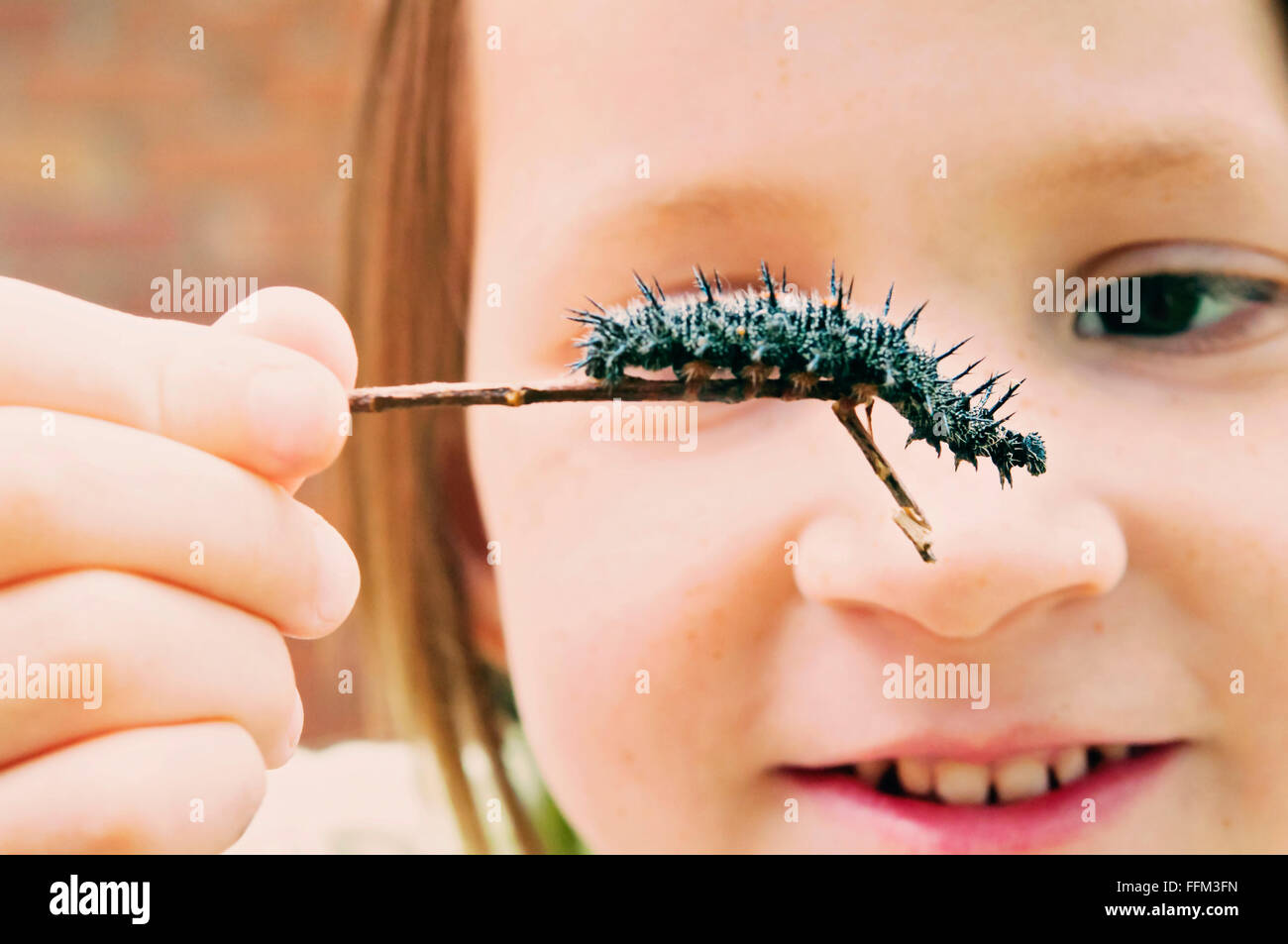 Girl with insect hi-res stock photography and images - Alamy