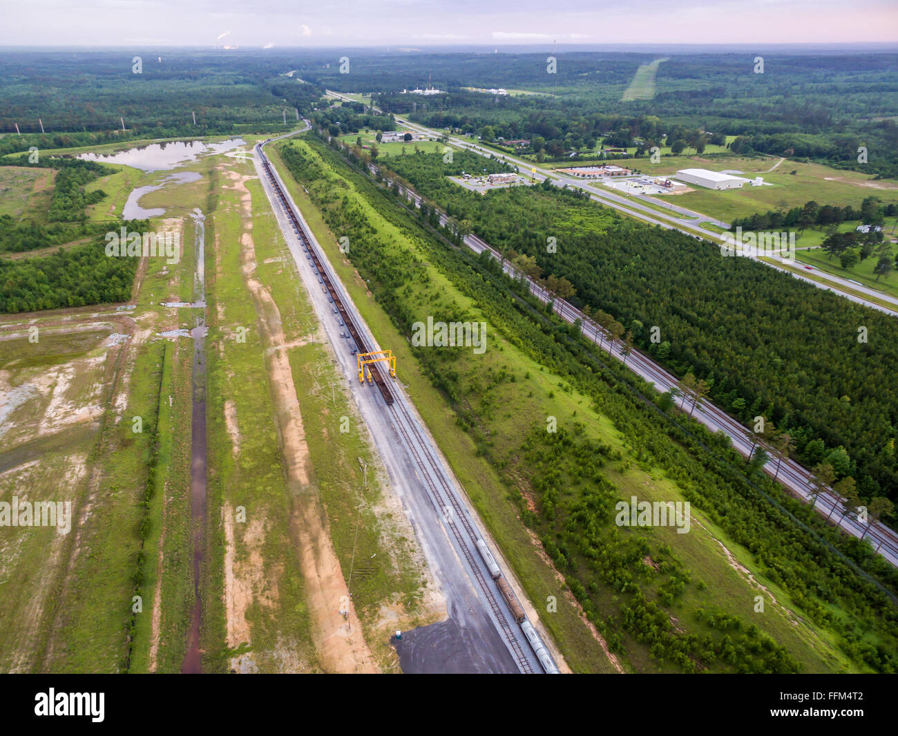 Aerial view - drone view of rail cars on train tracks in Alabama ready ...