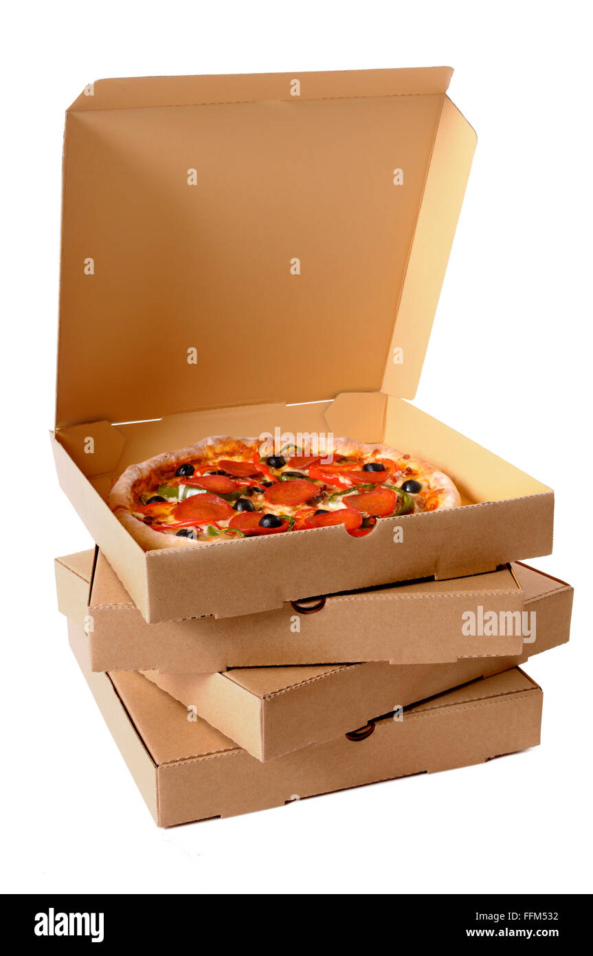 Freshly baked Italian pepperoni Pizza with a stack of delivery boxes ...