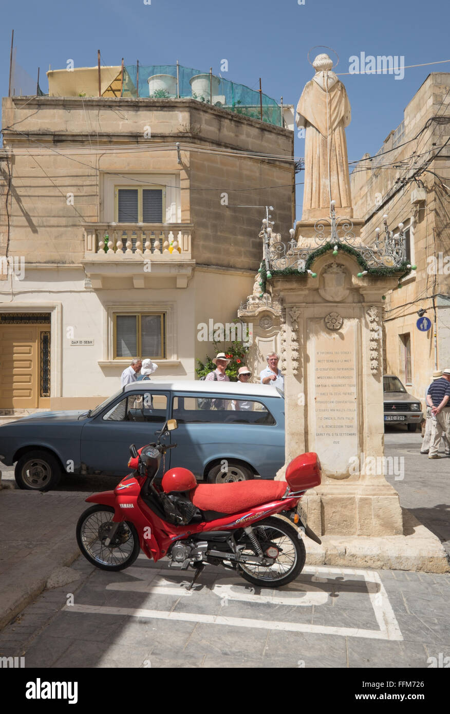 Motorcycle and statue at Rabat in Malta Stock Photo - Alamy