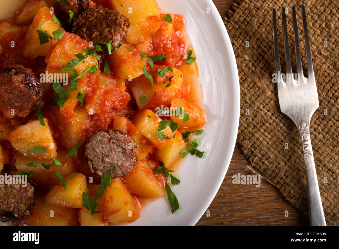 Potatoes with chorizo cooked Rioja style, a traditional Spanish recipe ...