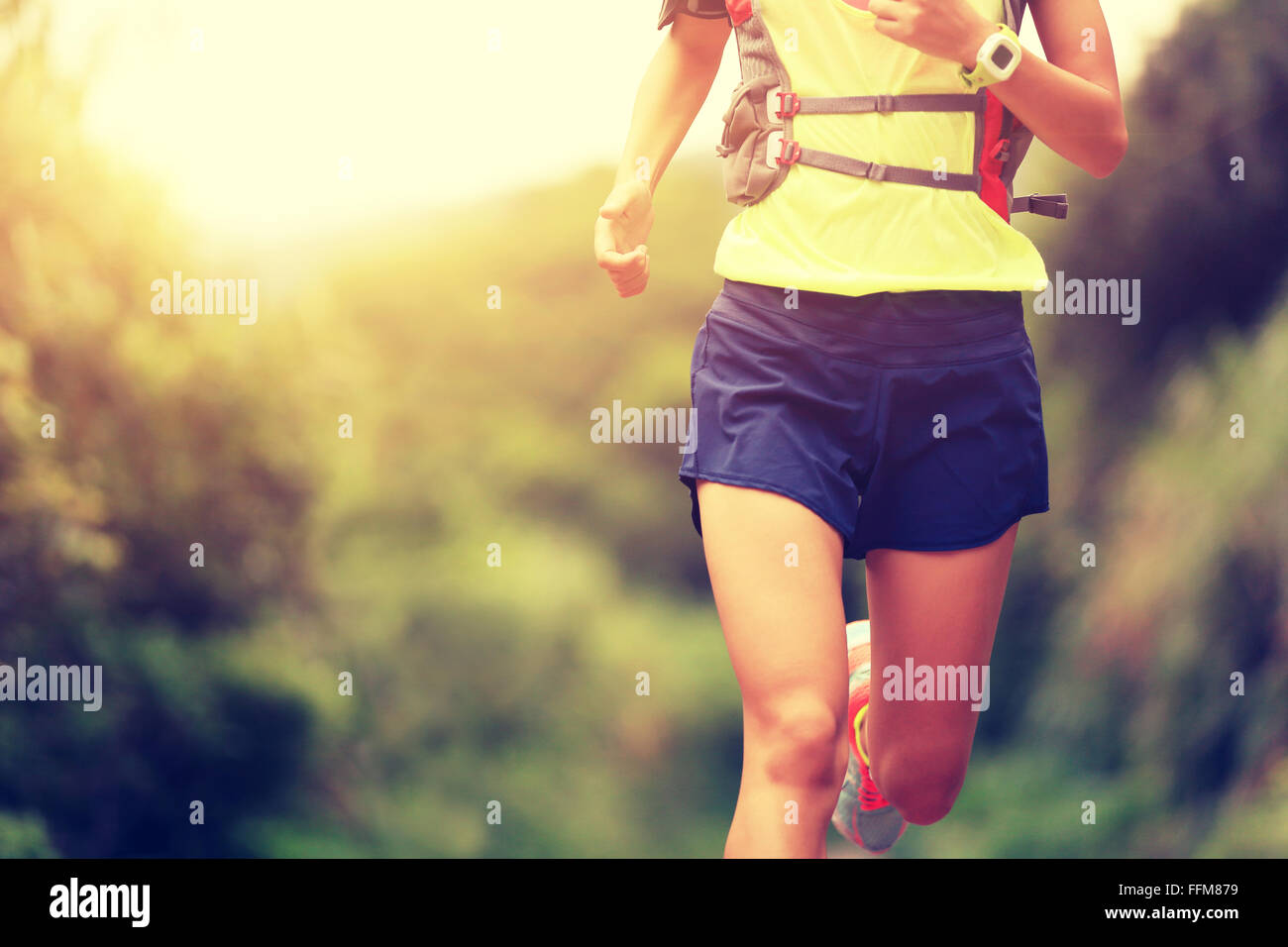 young fitness woman trail runner running on trail Stock Photo - Alamy