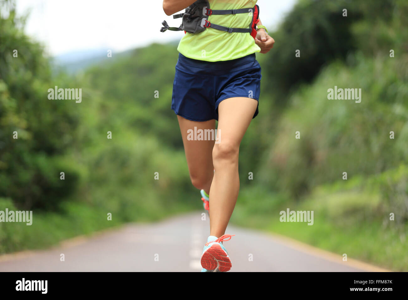young fitness woman trail runner running on trail Stock Photo - Alamy