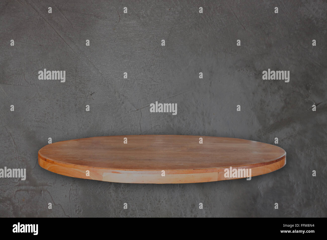 Empty wooden table over vintage concrete background for product display ...