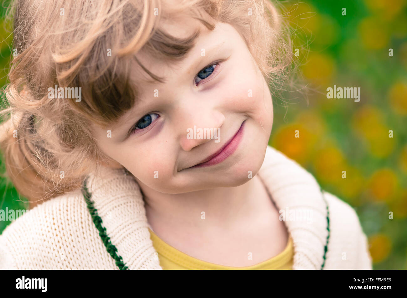blond girl with blue eyes smiling Stock Photo - Alamy