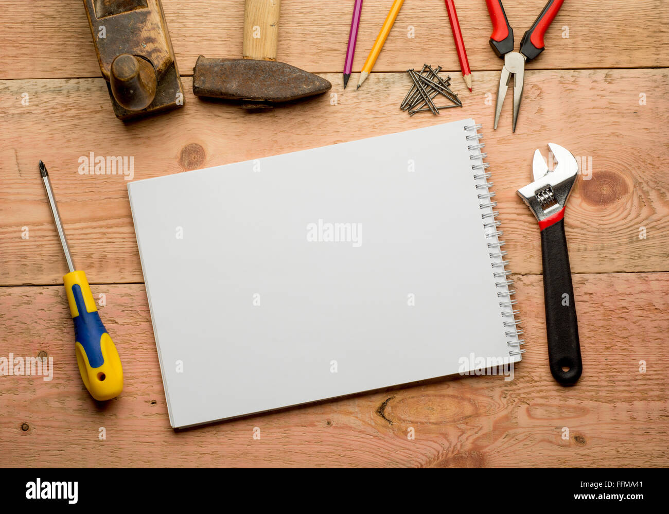 Set of tools over a wood panel with space for text Stock Photo - Alamy