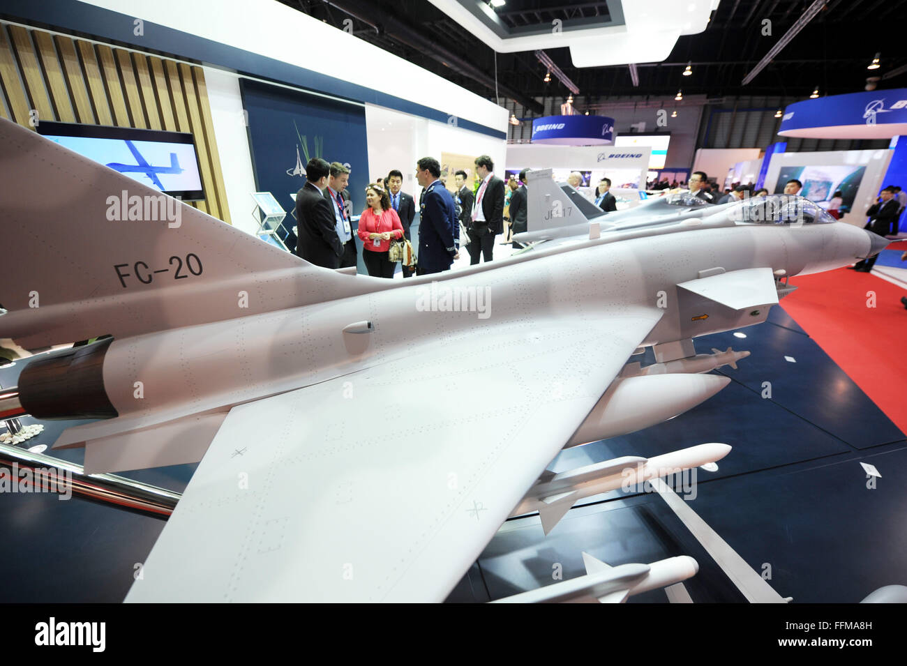 Singapore. 16th Feb, 2016. Audience visit the joint booth of AVIC ...