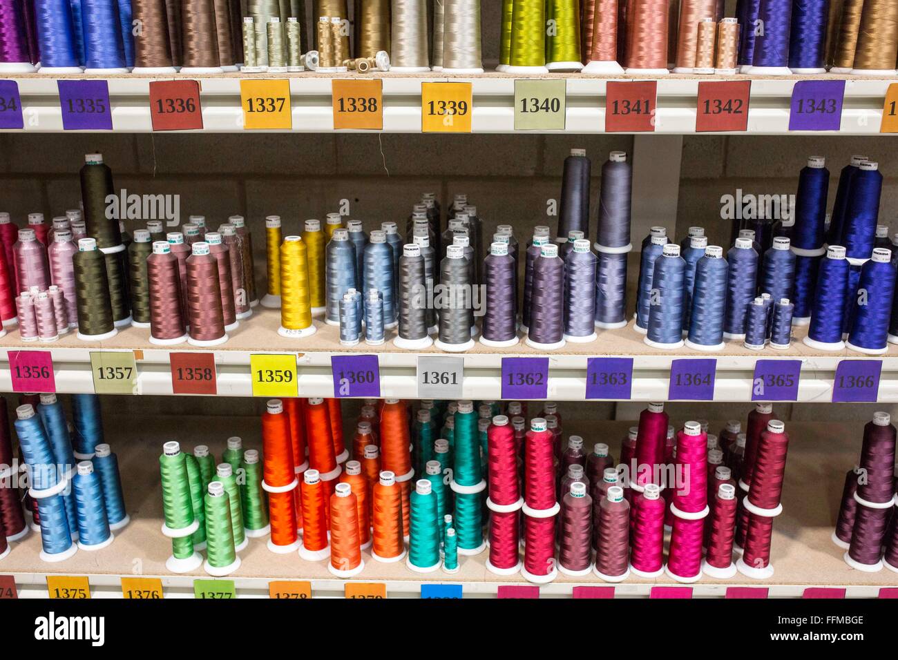 colourful cotton reels in an English factory Stock Photo - Alamy