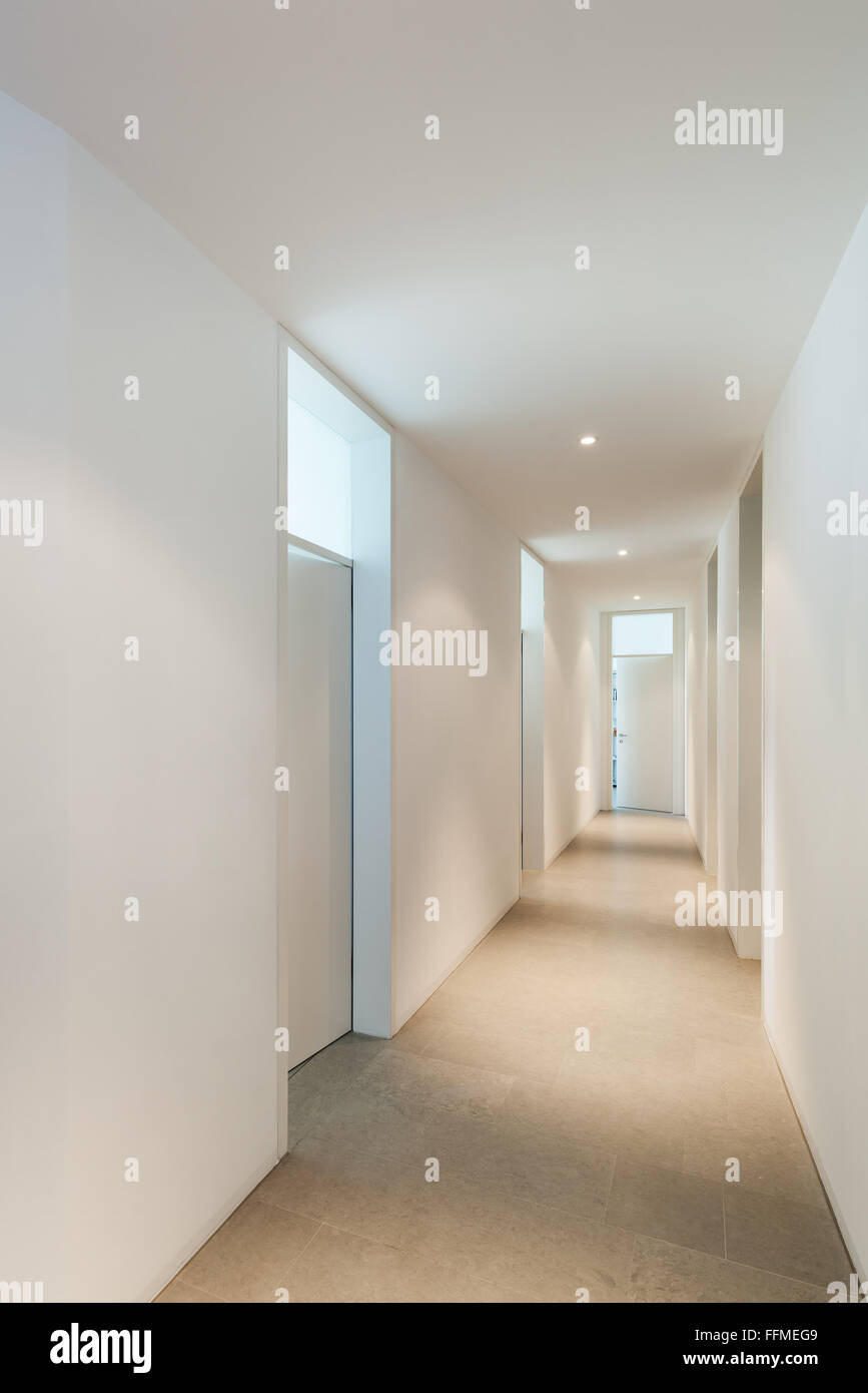 Interior of a modern house, corridor with many doors Stock Photo - Alamy