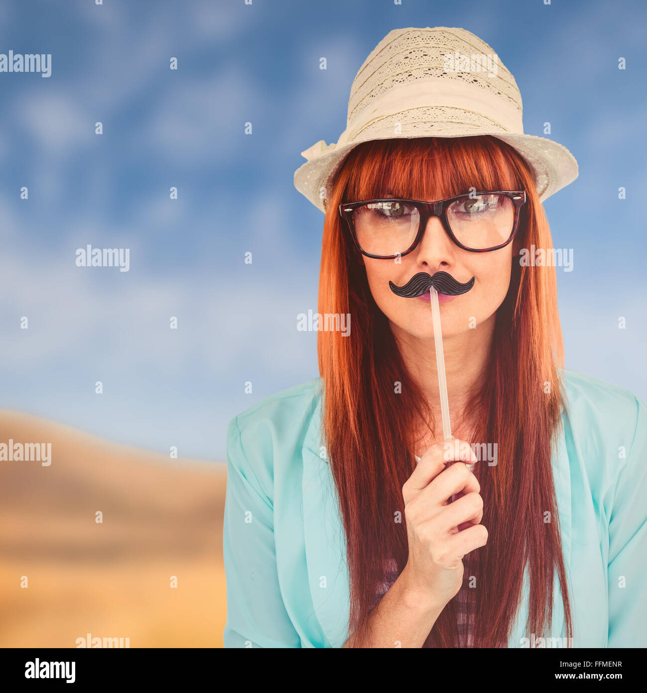 Composite image of happy smiling hipster with a mustache Stock Photo ...