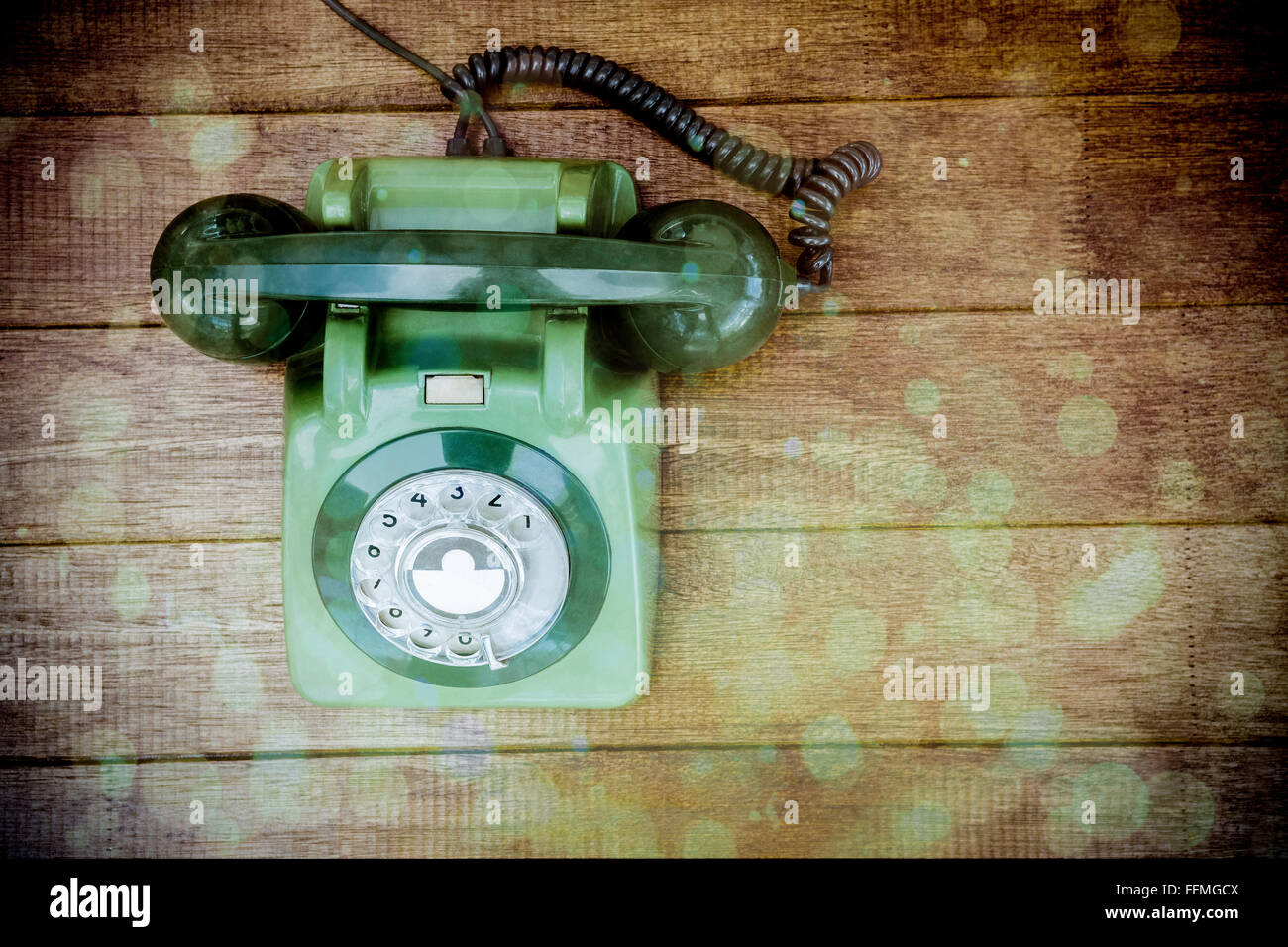 Composite image of yellow abstract light spot design Stock Photo - Alamy