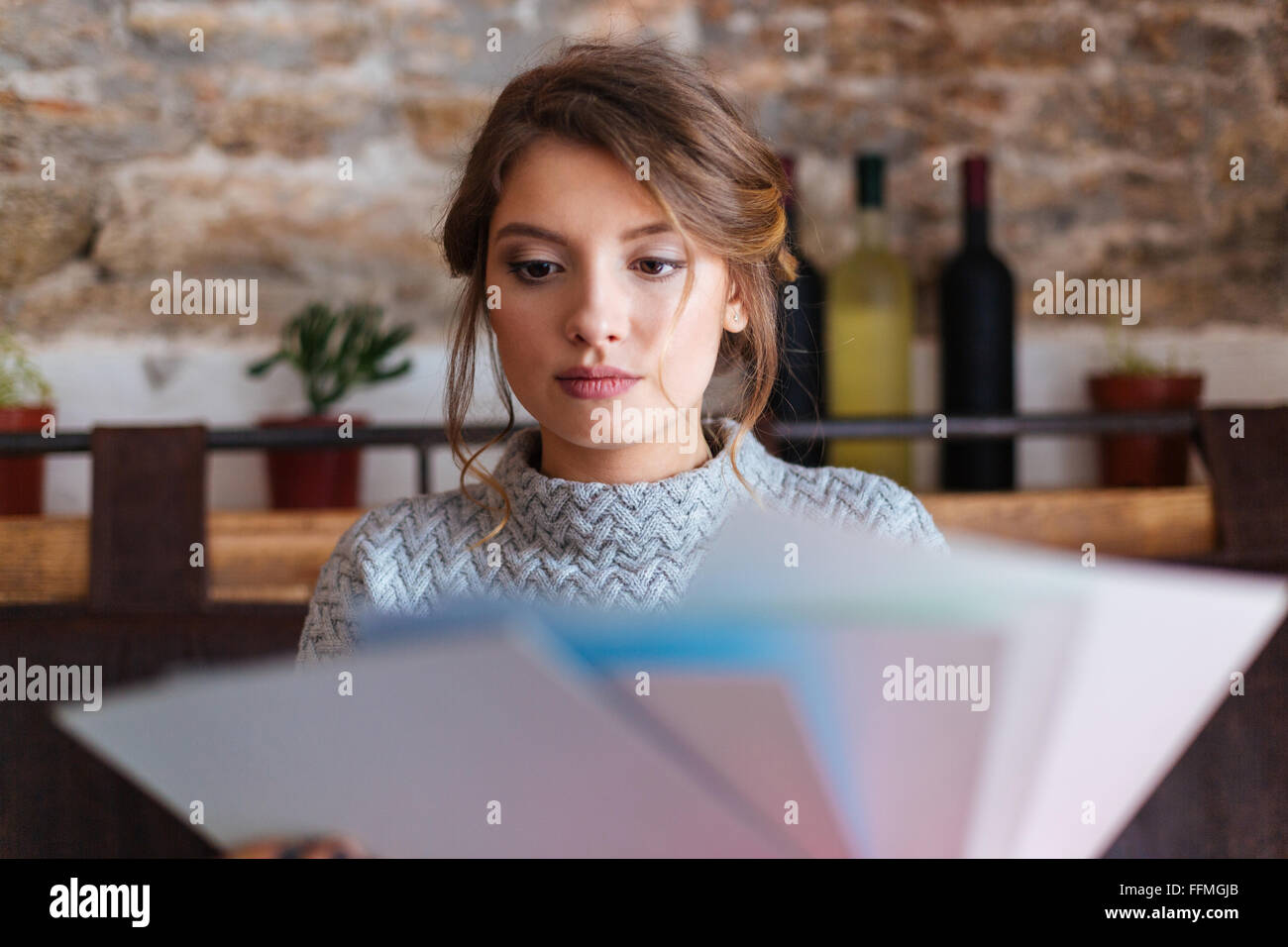 Choosing paper hi-res stock photography and images - Alamy