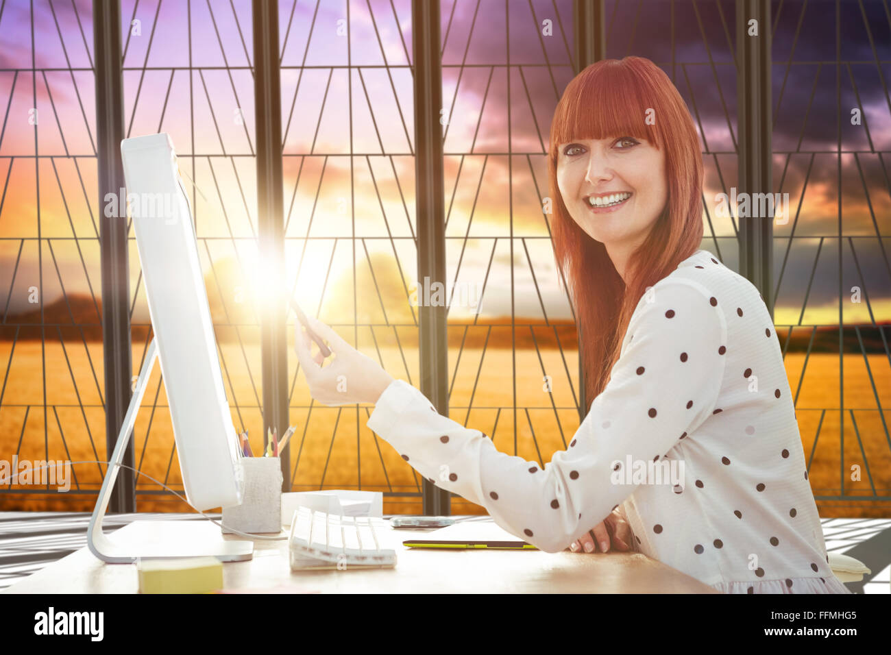 Composite image of smiling hipster woman pointing screen with pen Stock ...