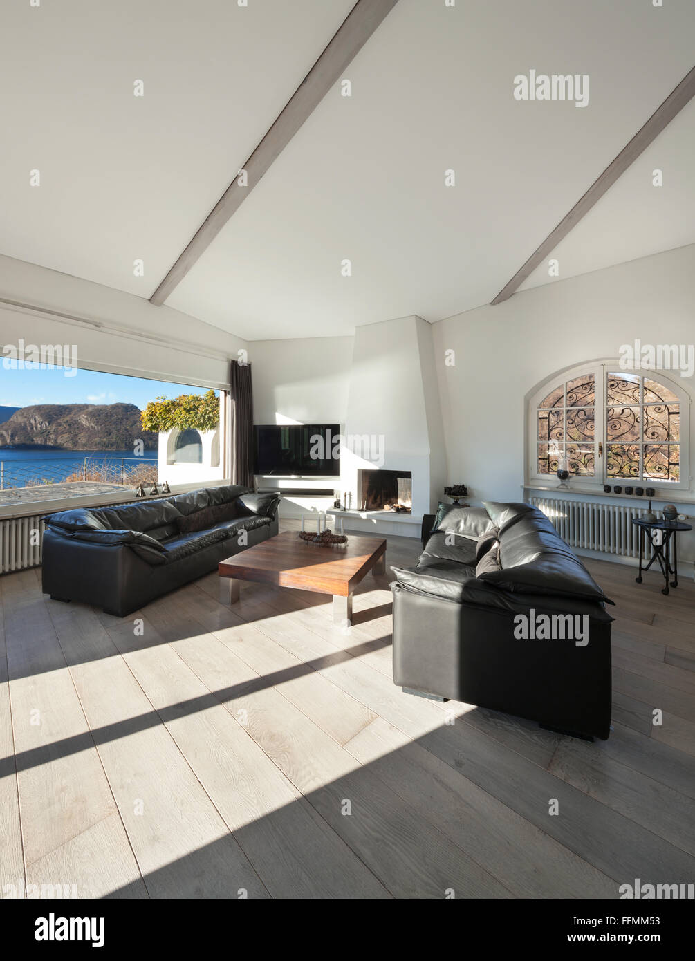 Interior of house, comfortable living room with wide window Stock Photo ...